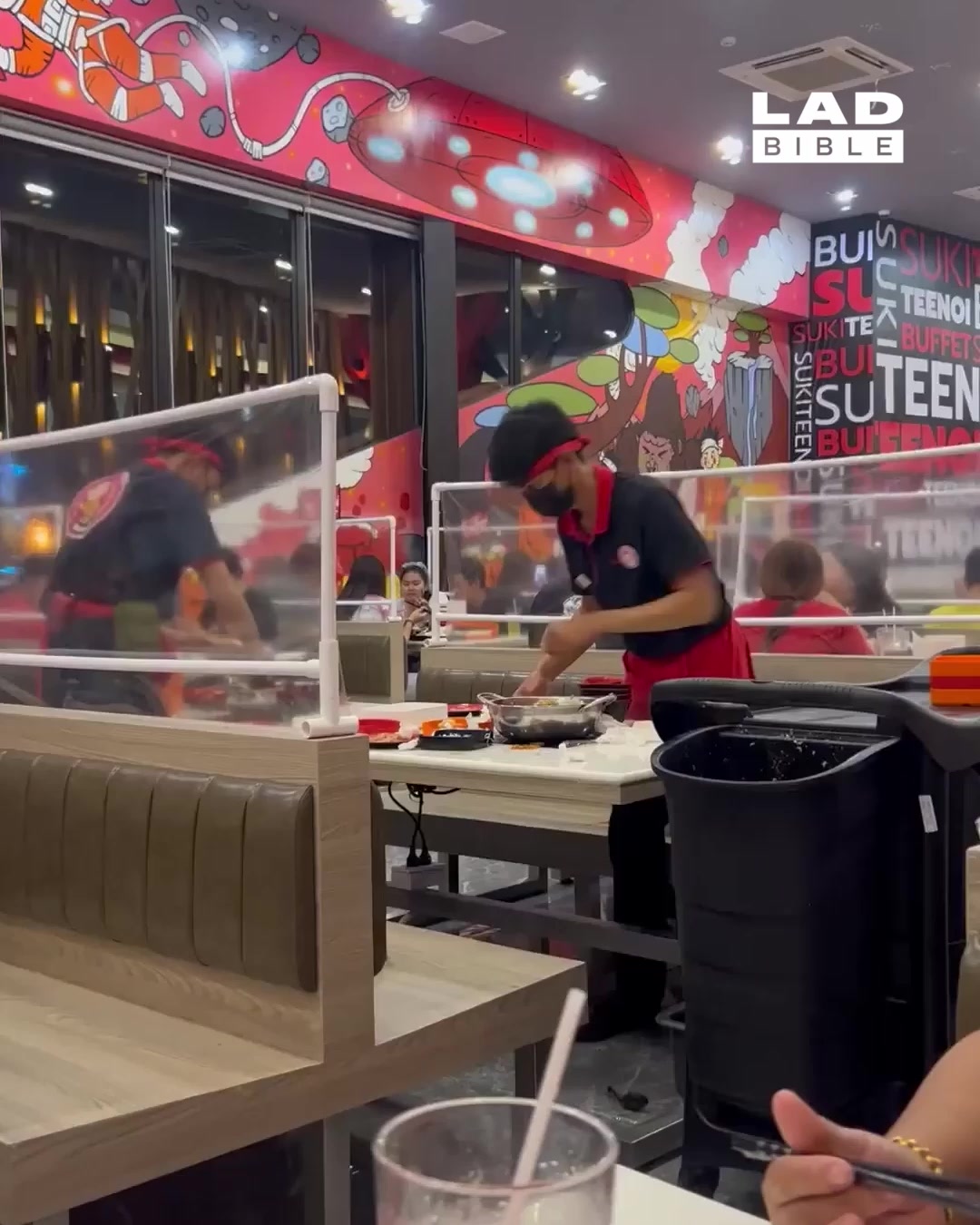 Two Dedicated Employees Quickly Clean Dirty Table